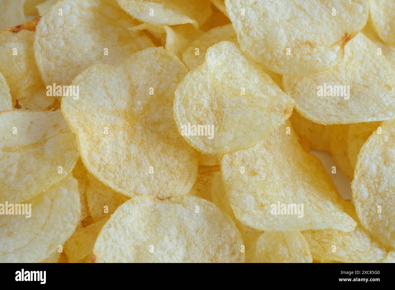 crispy potato chips snack texture background Stock Photo - Alamy