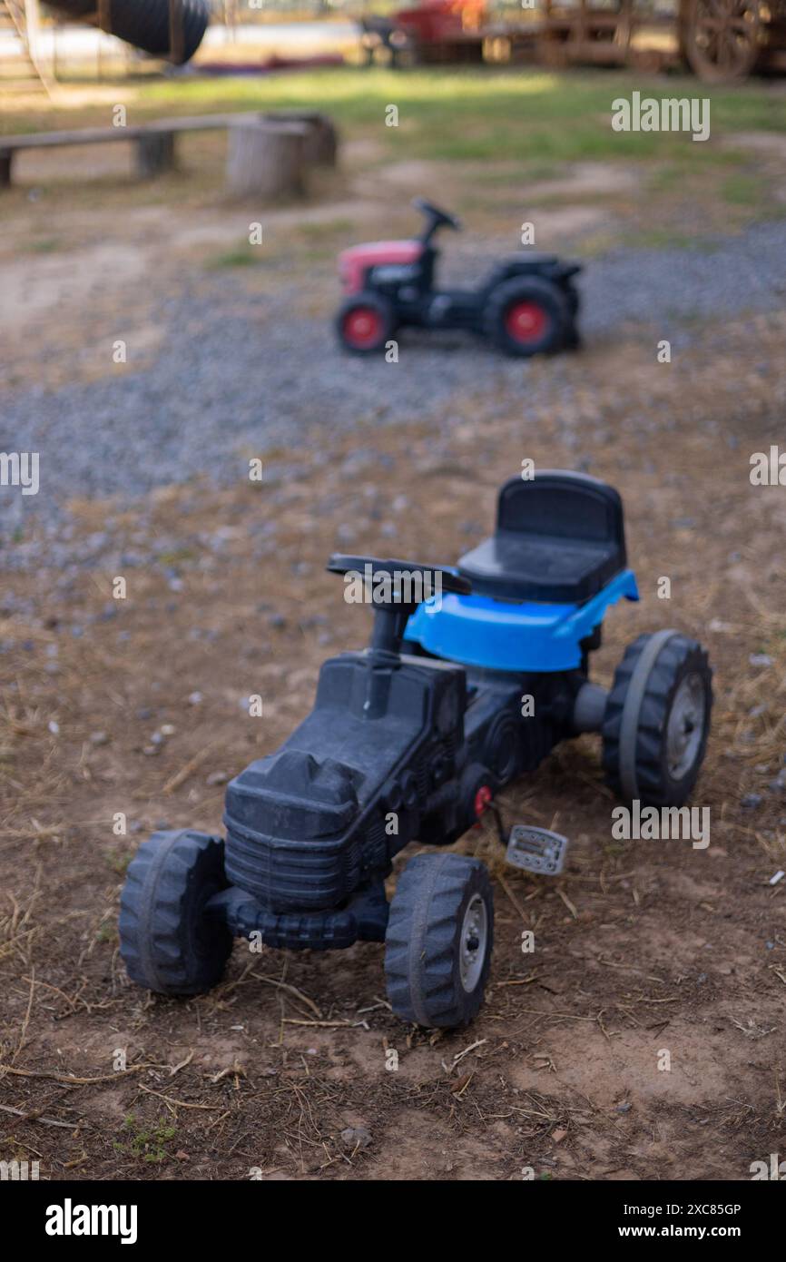 miniature tractor on eco farm Stock Photo - Alamy