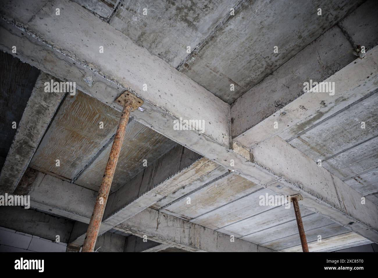 building under construction with iron steel support concrete beams ...