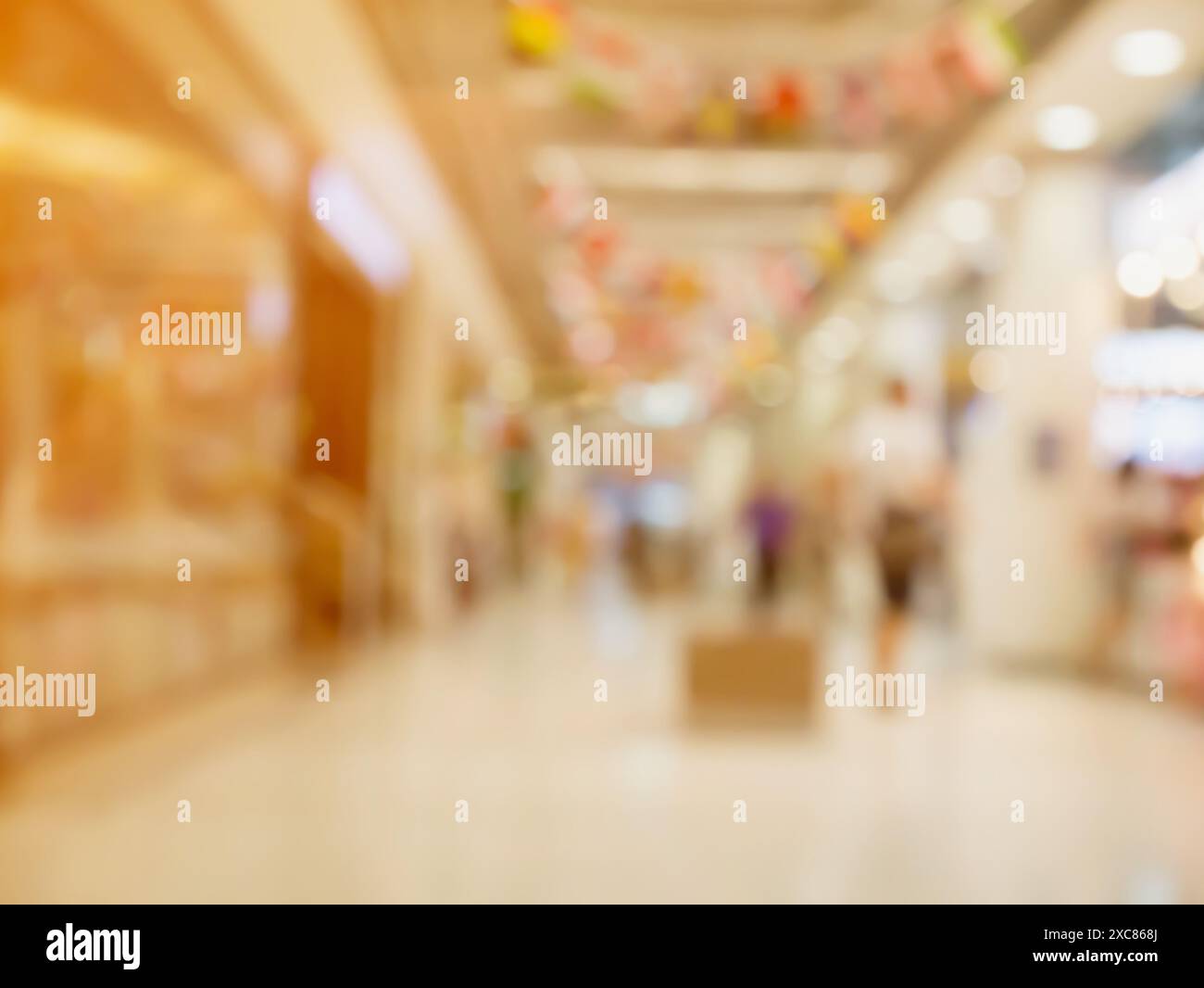 Shopping mall blur background with bokeh Stock Photo - Alamy