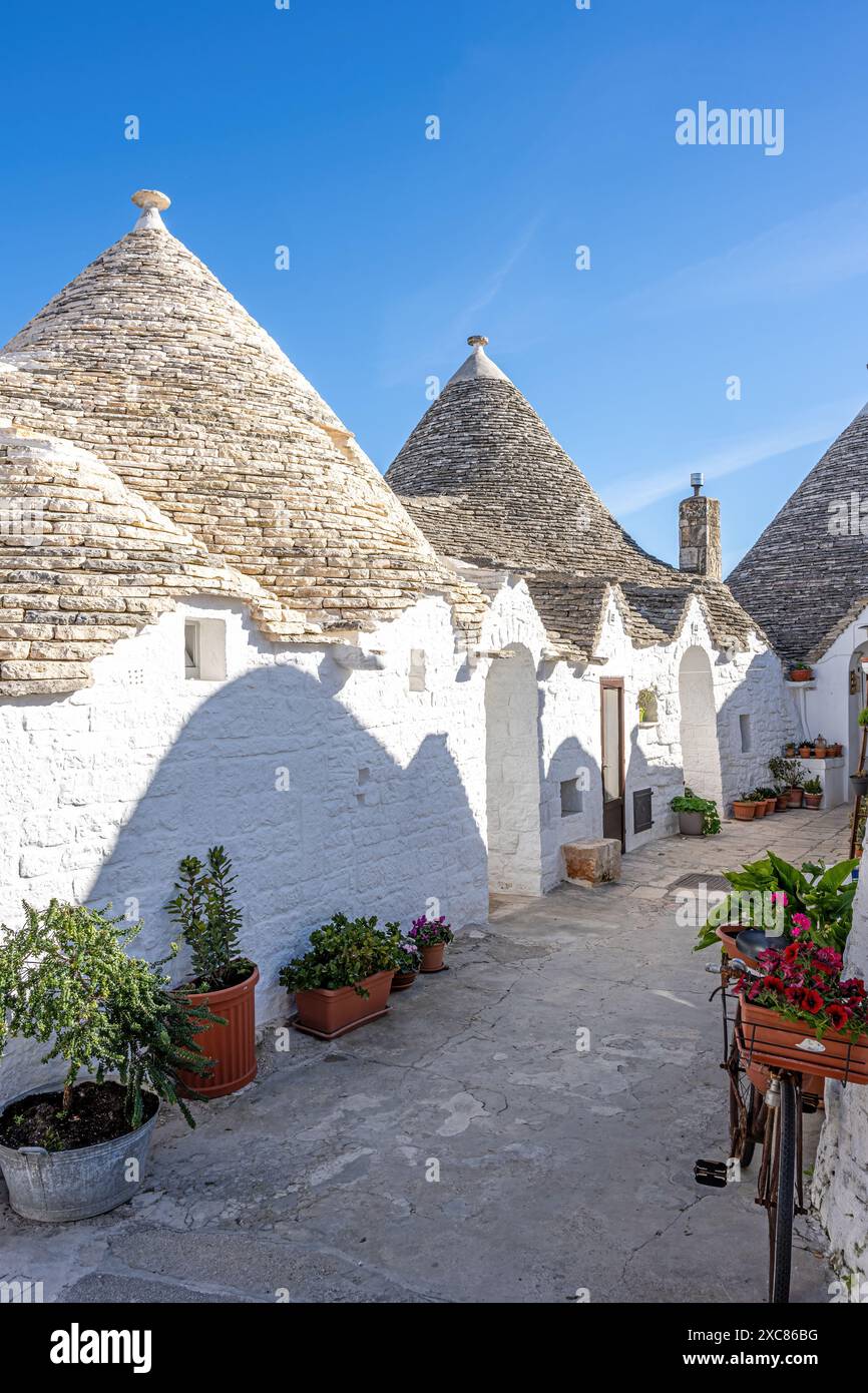 The famous trulli houses of Alberobello in Puglia, Italy Stock Photo ...