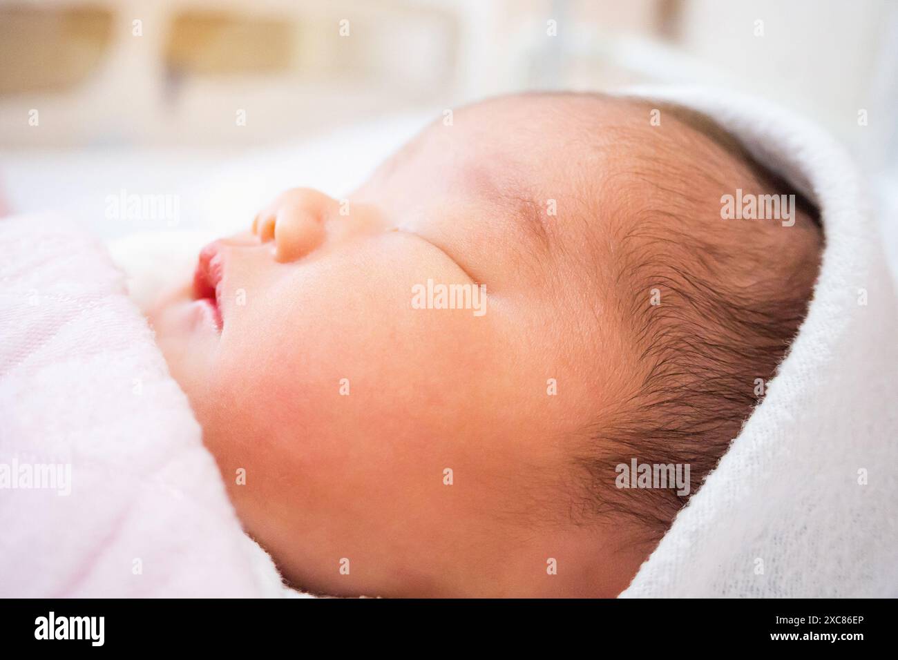 Cute newborn asian baby girl sleeping Stock Photo - Alamy