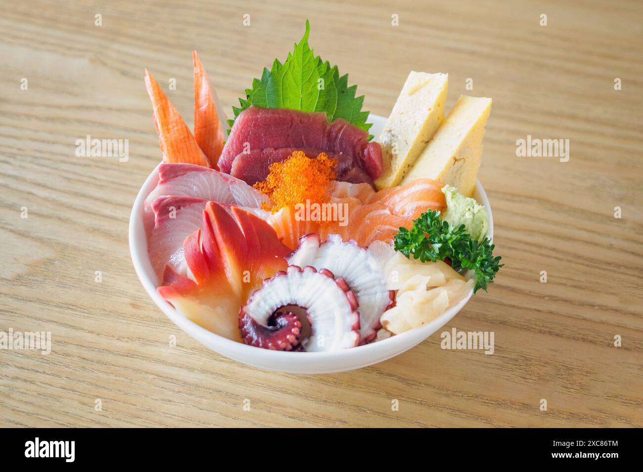 Sashimi Rice Bowl Chirashi Don Japanese food on wood table in ...