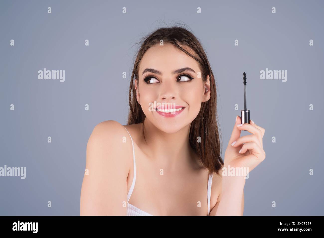 Woman shaping brown eyebrows. Woman eye with beautiful eyebrows. Shaped brows, long eyelashes ...