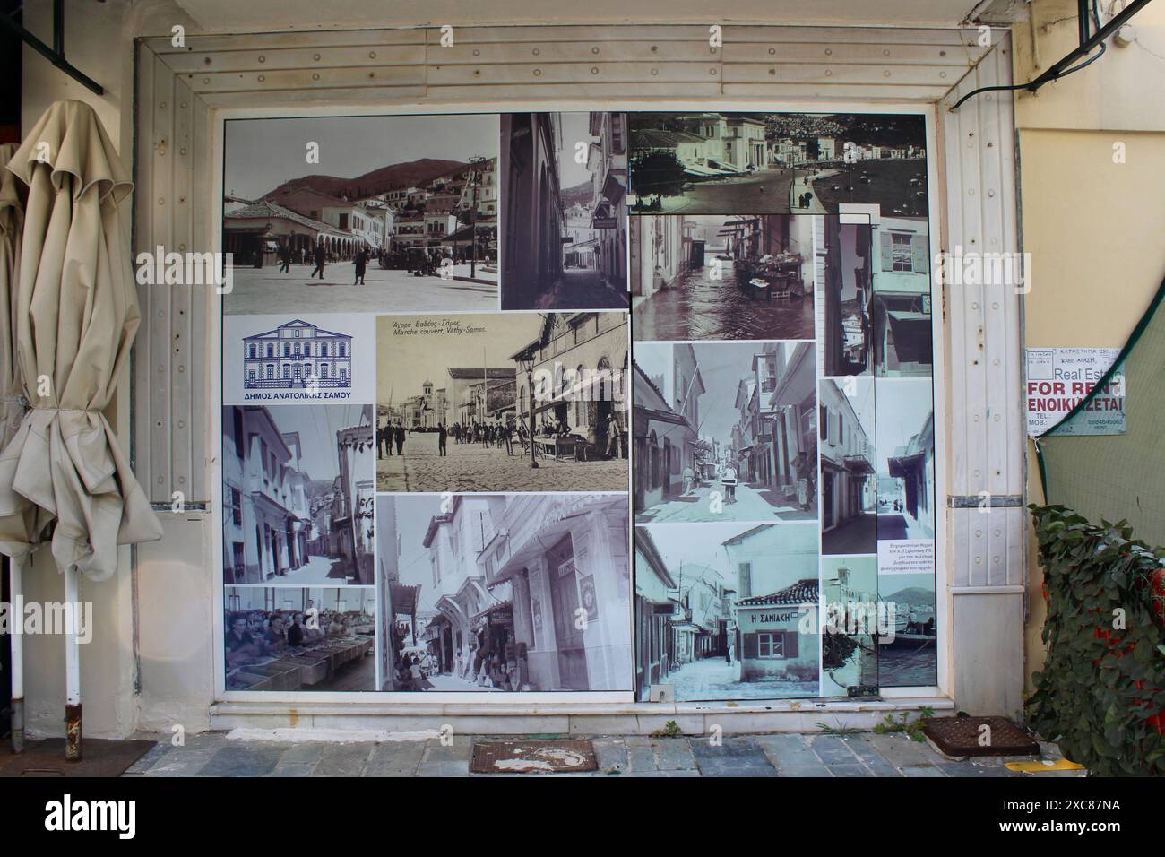 Display board with old photographs of Samos in Samos Town Stock Photo ...