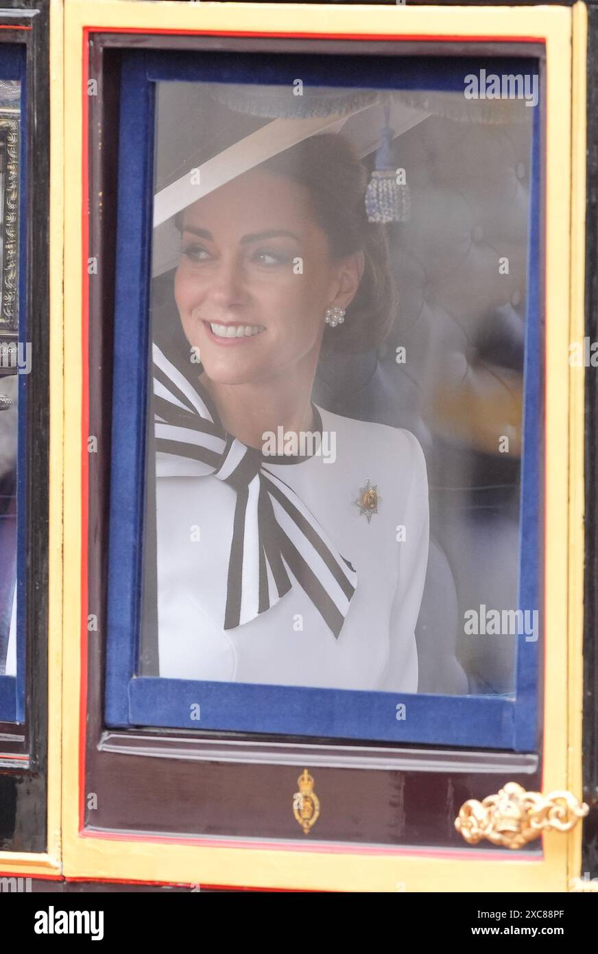 The Princess of Wales smiles as she travels along The Mall to the ...