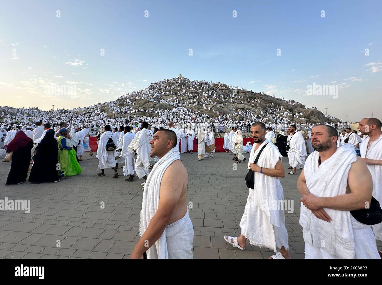 Muslim pilgrims pray at dawn on Saudi Arabia s Mount Arafat, also known ...