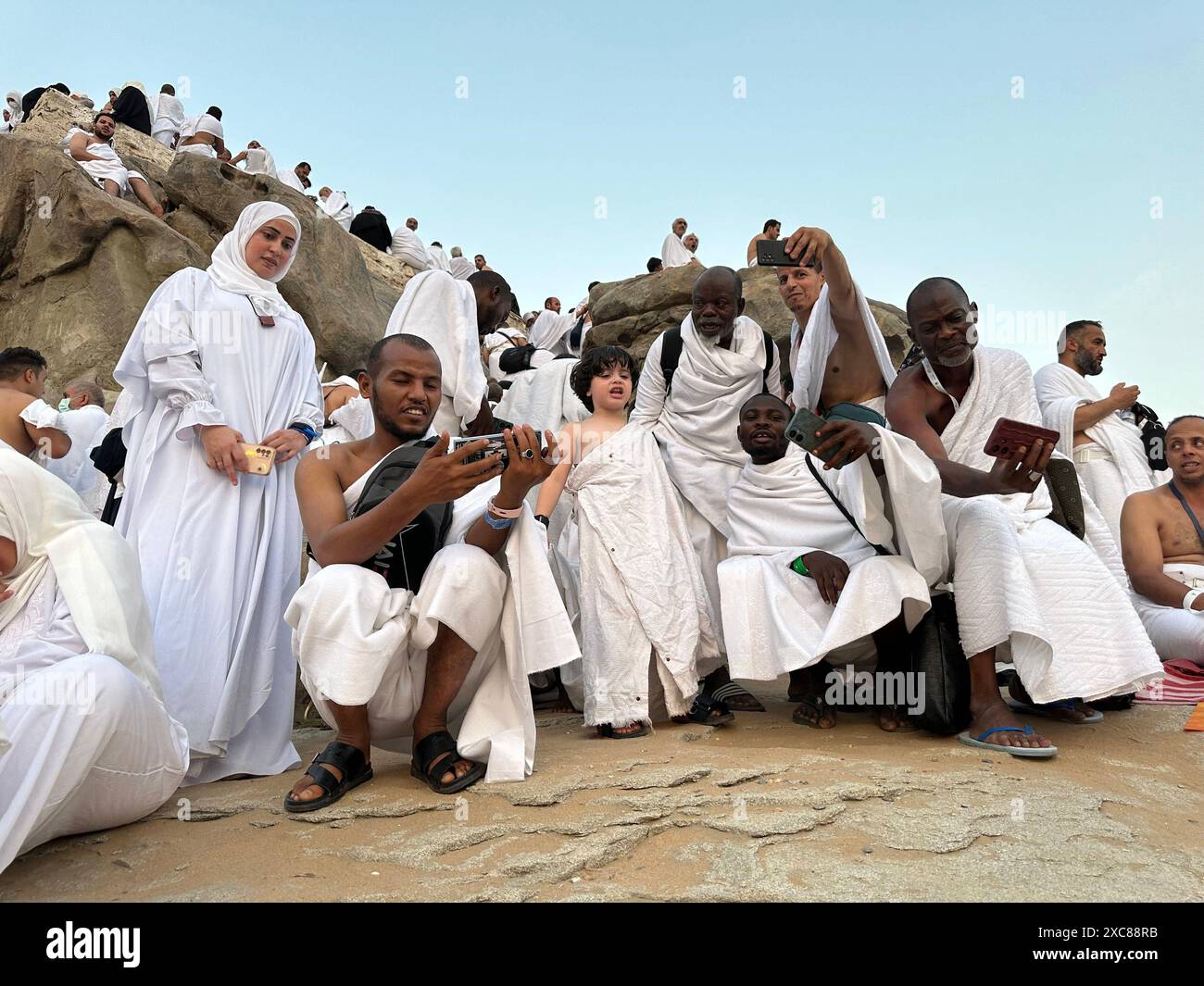 Muslim pilgrims pray at dawn on Saudi Arabia s Mount Arafat, also known as Jabal al-Rahma or ...