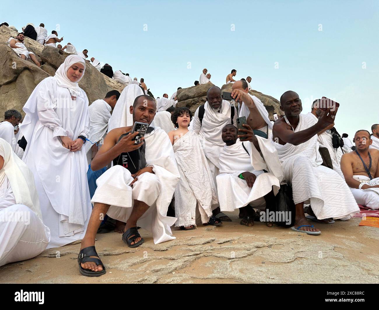 Muslim pilgrims pray at dawn on Saudi Arabia s Mount Arafat, also known ...