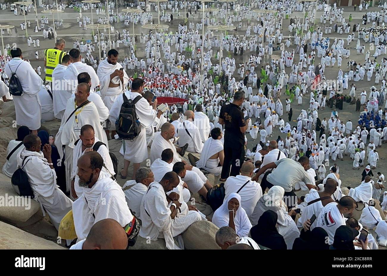 Muslim pilgrims pray at dawn on Saudi Arabia s Mount Arafat, also known as Jabal al-Rahma or ...