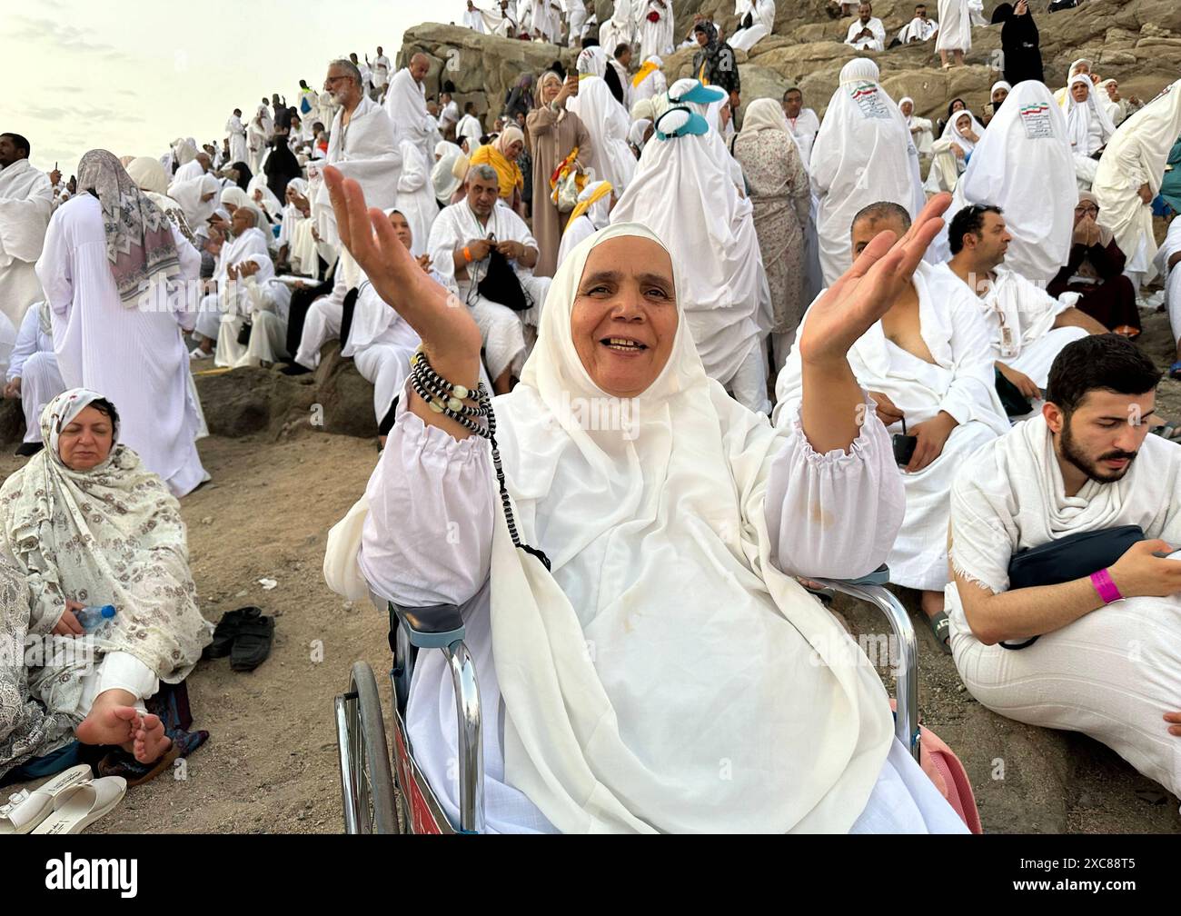 Muslim pilgrims pray at dawn on Saudi Arabia s Mount Arafat, also known as Jabal al-Rahma or ...