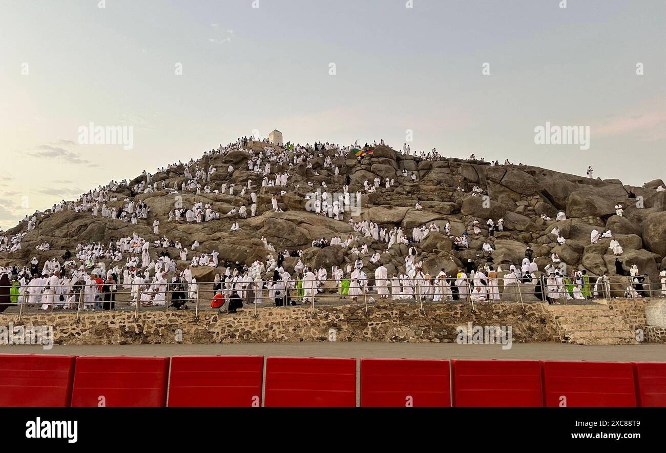 Muslim pilgrims pray at dawn on Saudi Arabia s Mount Arafat, also known ...