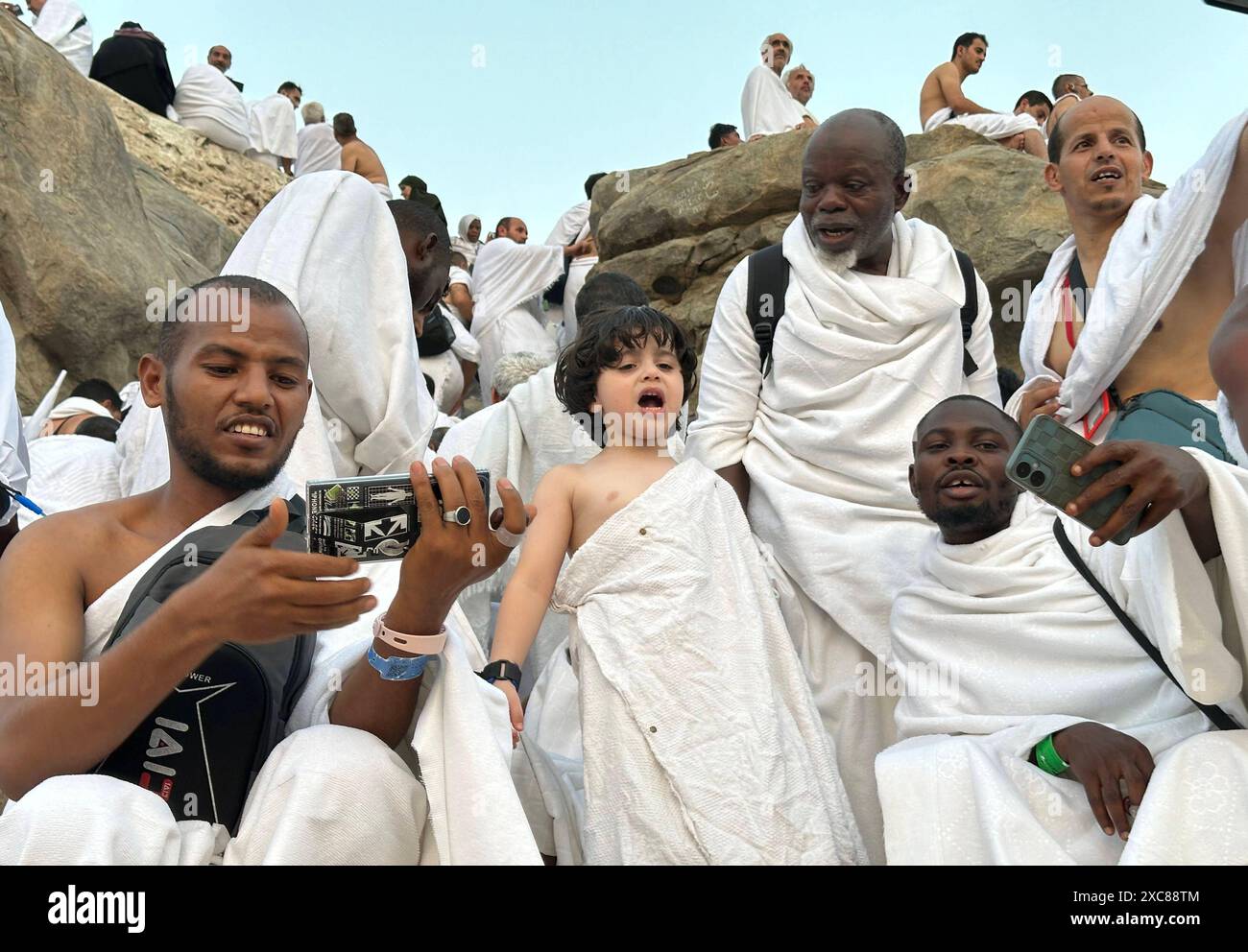 Muslim pilgrims pray at dawn on Saudi Arabia s Mount Arafat, also known ...