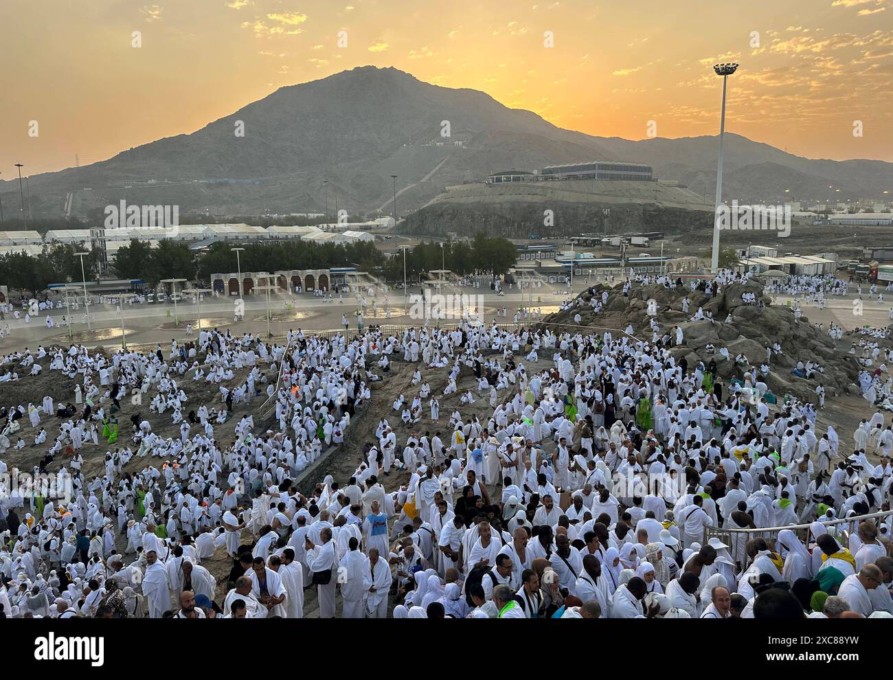 Muslim pilgrims pray at dawn on Saudi Arabia s Mount Arafat, also known ...