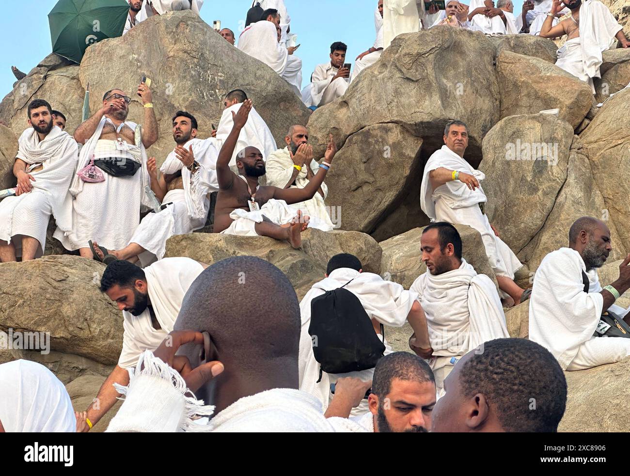 Muslim pilgrims pray at dawn on Saudi Arabia s Mount Arafat, also known ...