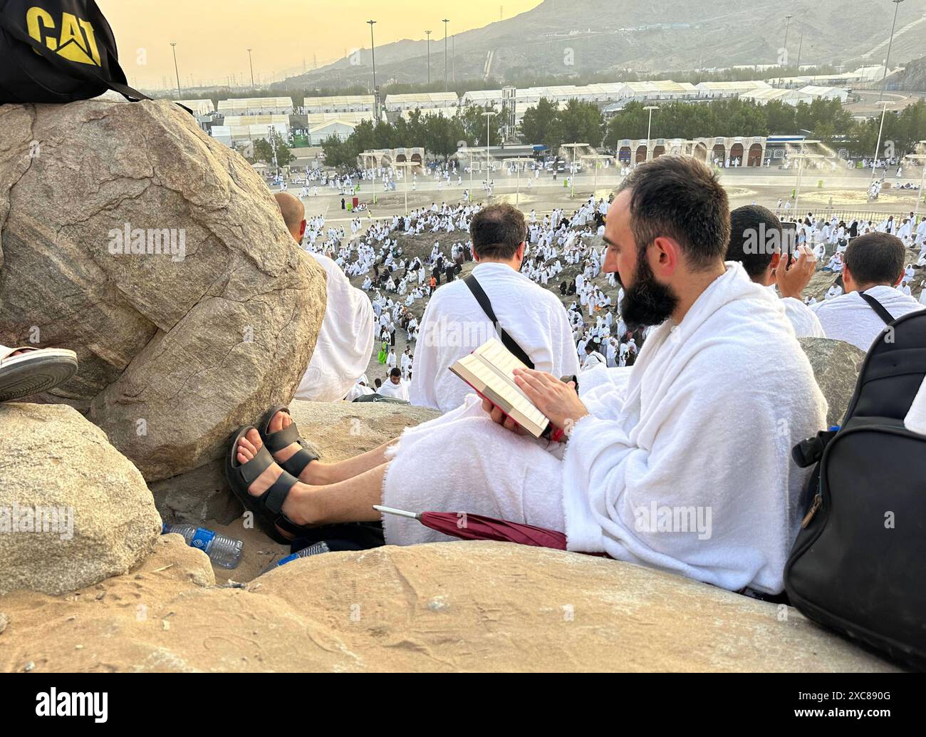 Muslim pilgrims pray at dawn on Saudi Arabia s Mount Arafat, also known ...