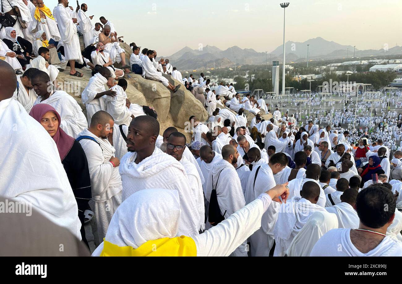 Muslim pilgrims pray at dawn on Saudi Arabia s Mount Arafat, also known ...