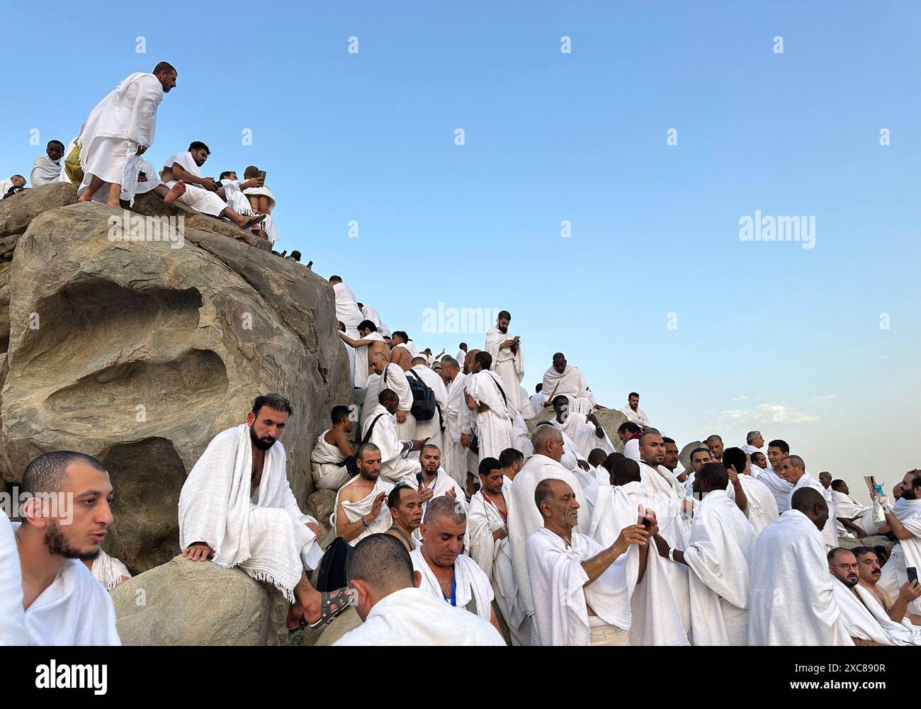 Muslim pilgrims pray at dawn on Saudi Arabia s Mount Arafat, also known ...