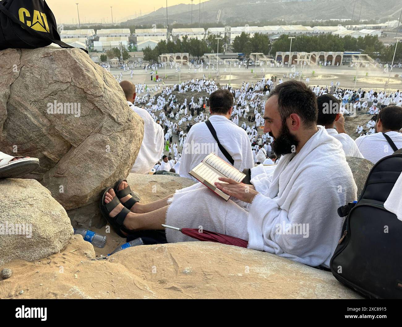 Muslim pilgrims pray at dawn on Saudi Arabia s Mount Arafat, also known ...