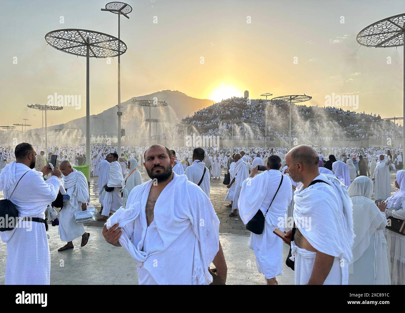 Muslim pilgrims arrive on Mount Arafat during the Hajj 2024 pilgrimage ...
