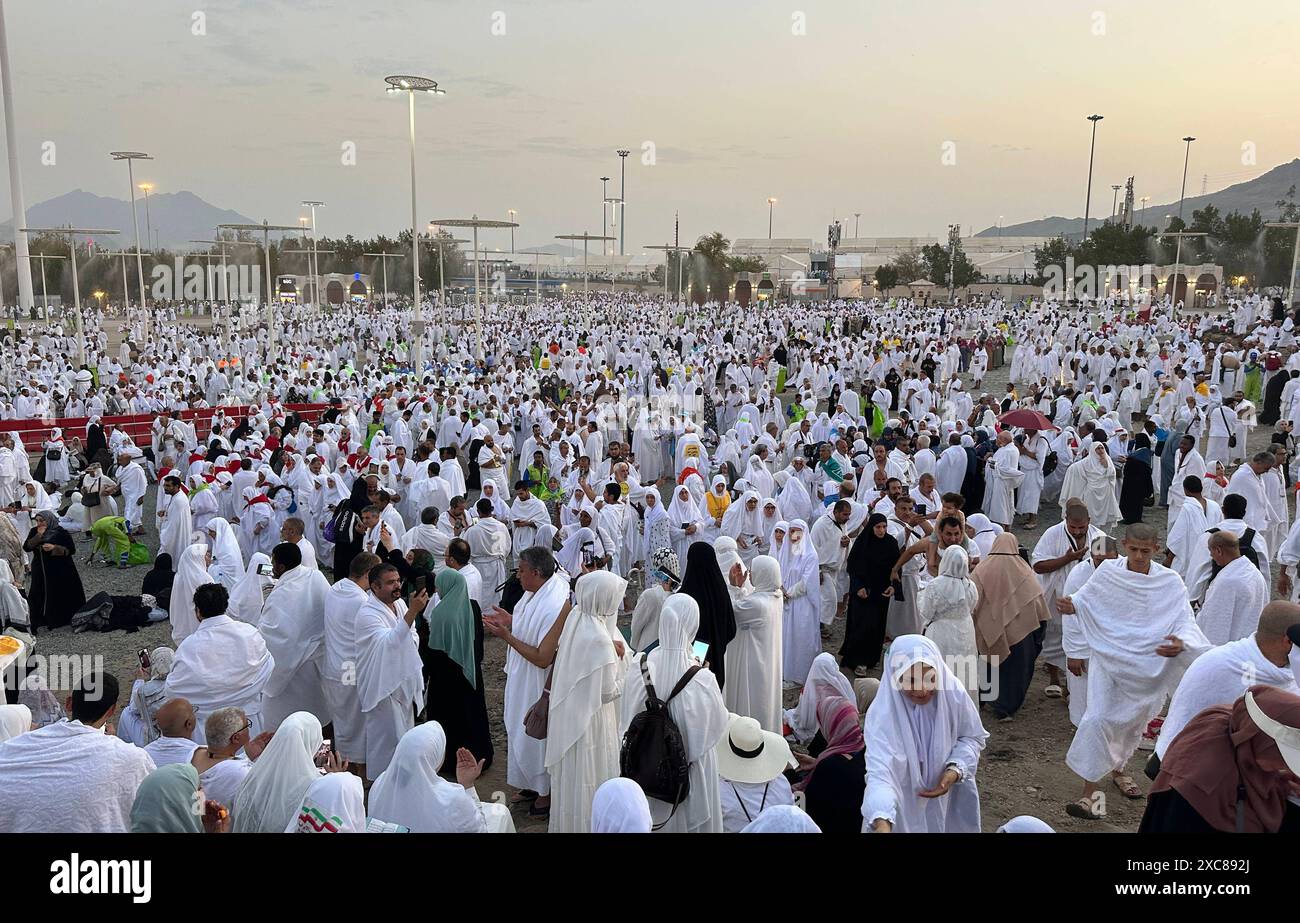 Muslim pilgrims pray at dawn on Saudi Arabia s Mount Arafat, also known ...