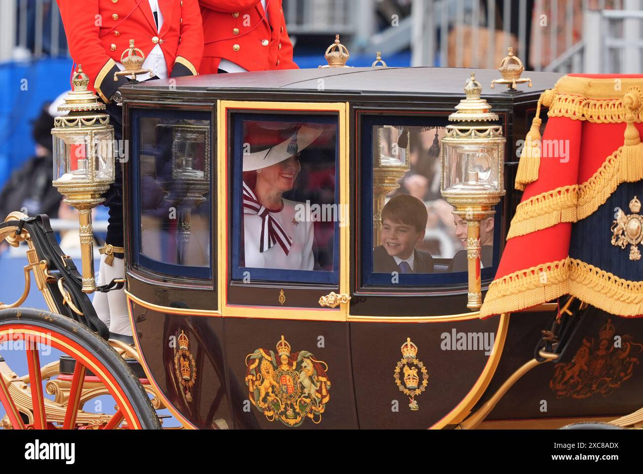 The Princess of Wales smiles as she arrives with Prince Louis at the ...