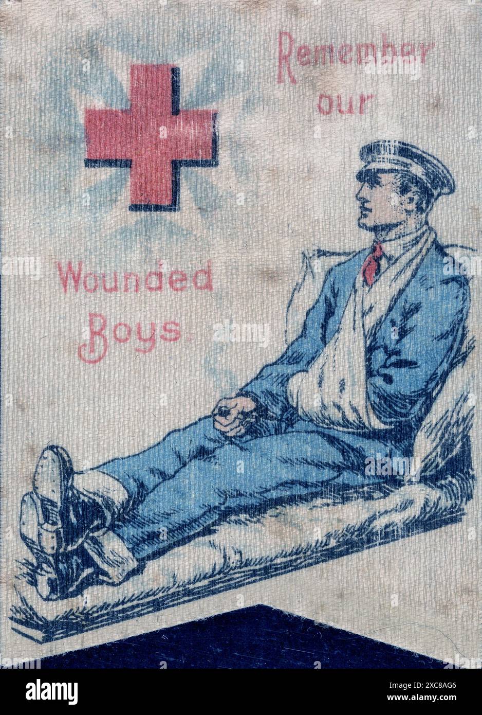 A silk World War I badge, printed in red and blue on a white background ...