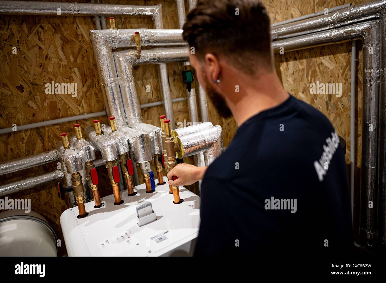 Blankenfelde Mahlow, Germany. 14th June, 2024. A craftsman works on a ...