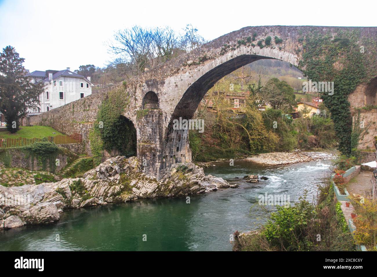 The roman bridge in the town of Cangas the Onis, Asturias, Spain Stock ...