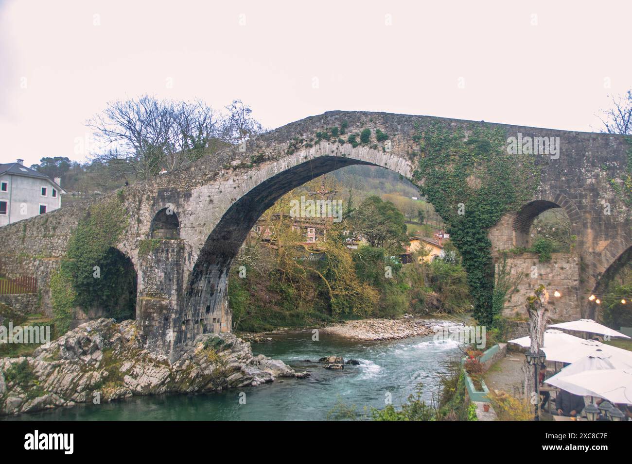 The roman bridge in the town of Cangas the Onis, Asturias, Spain Stock ...