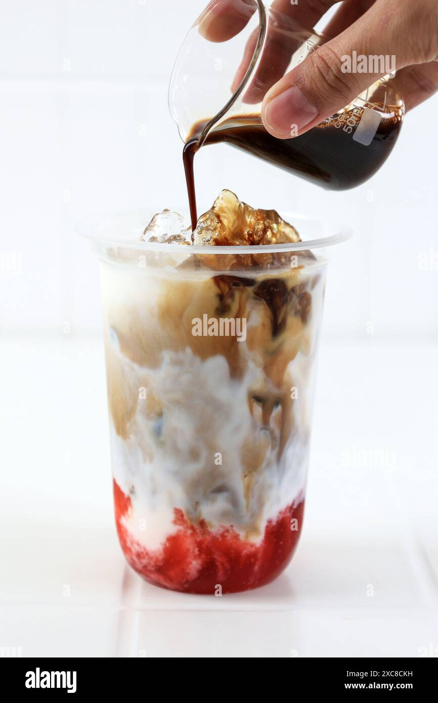 Pour Coffee to the Cup, Process Making Iced Strawberry Milk Latte Stock ...