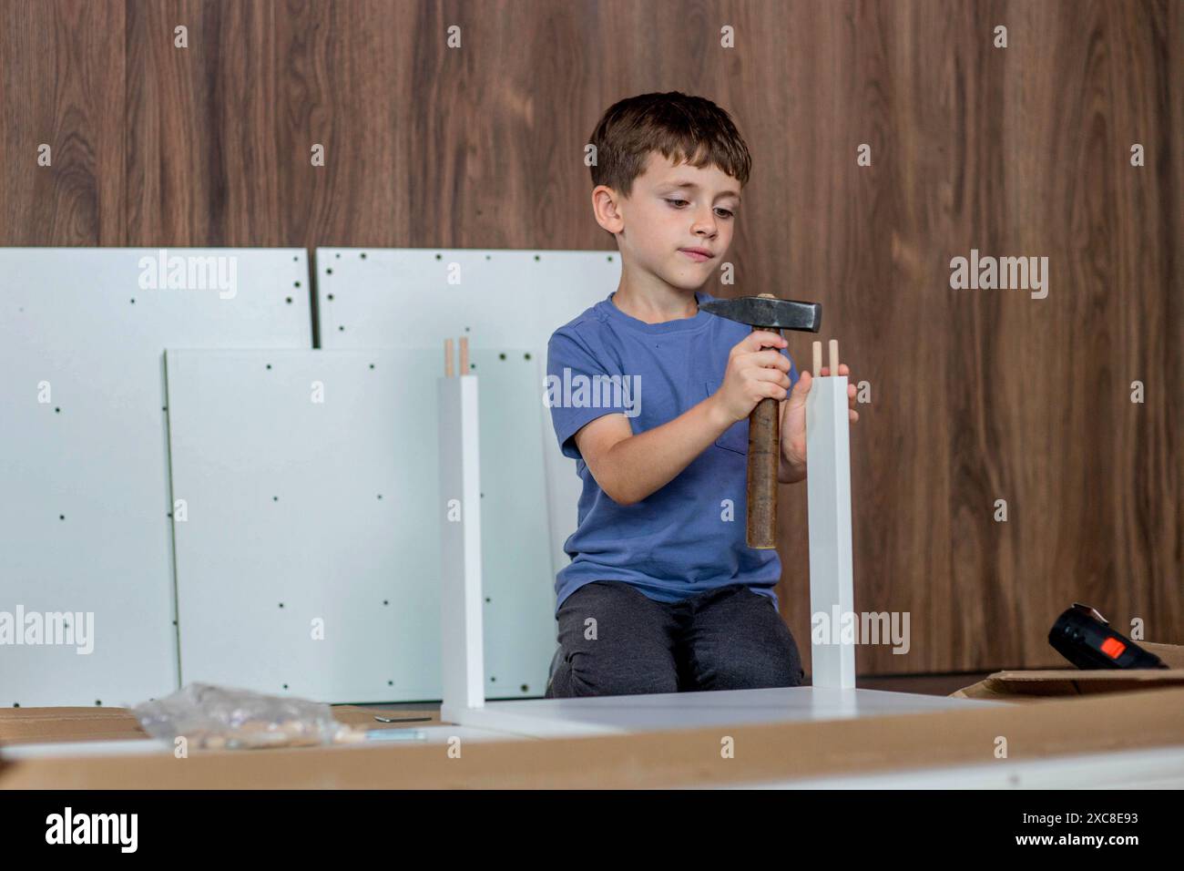 Furniture assembly worker hammers hi-res stock photography and images ...