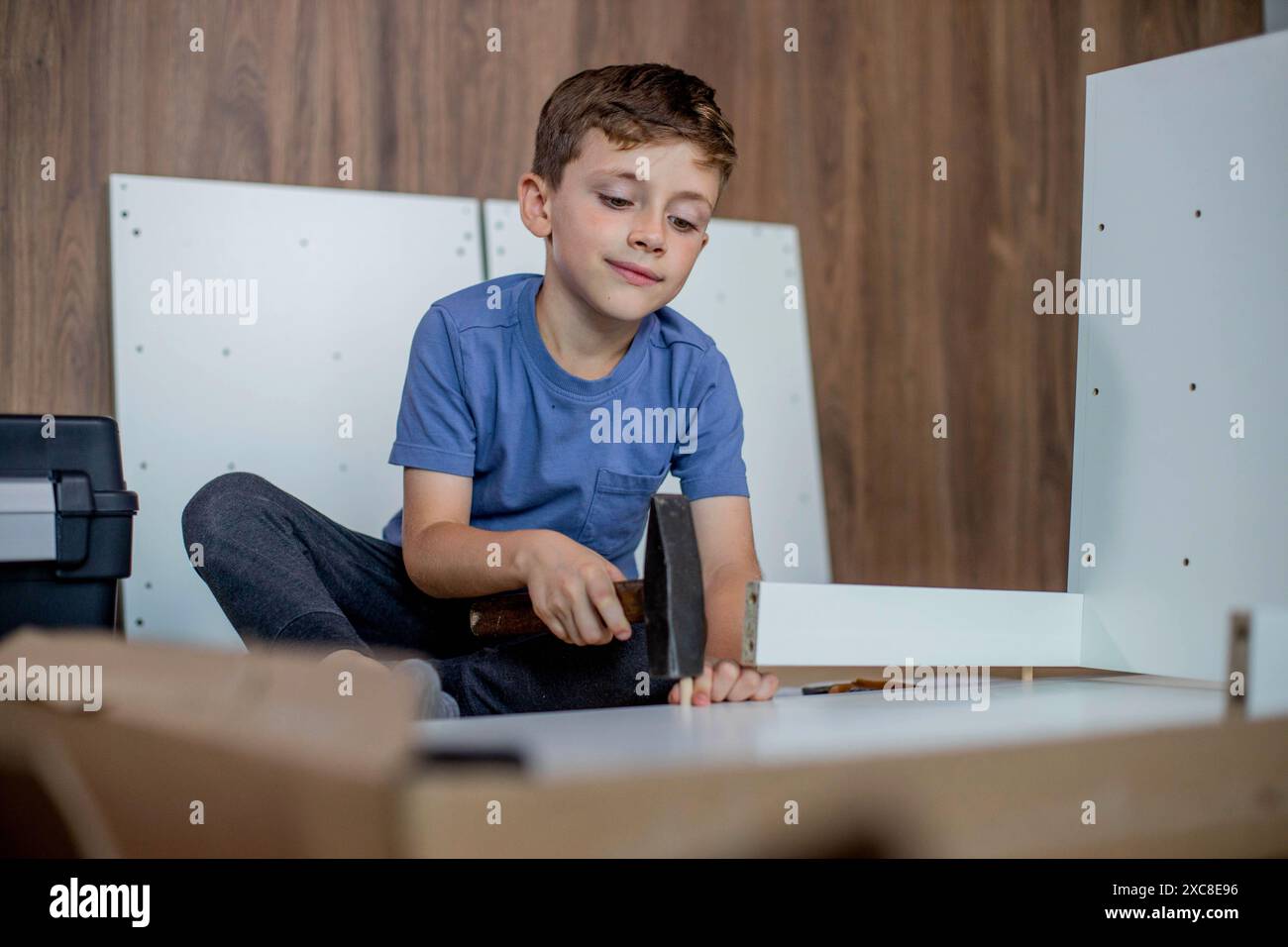 Furniture assembly worker hammers hi-res stock photography and images ...