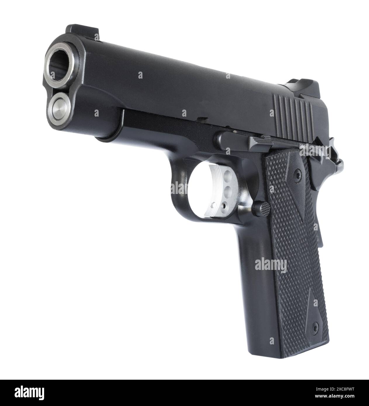 Large semi auto handgun that is black with checkerd grips Stock Photo ...