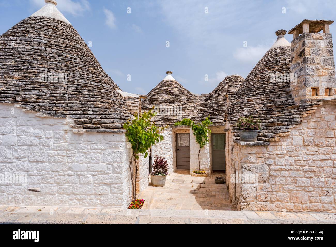 Famous historic old dry stone trulli houses with conical roofs in ...