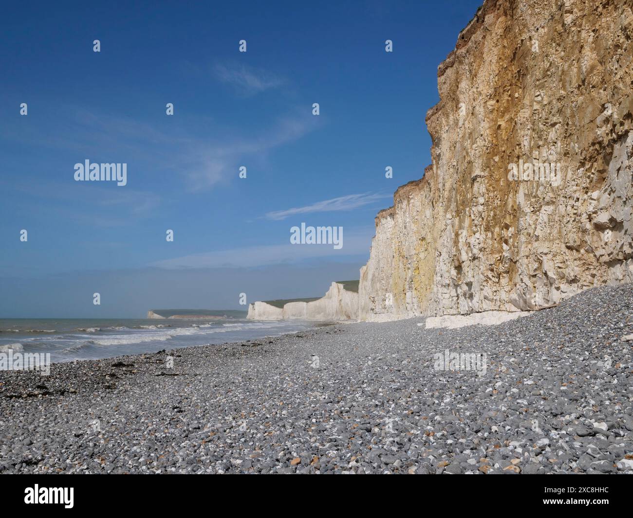 Scenic view of Seven Sisters cliffs towering above the beach at Birling ...