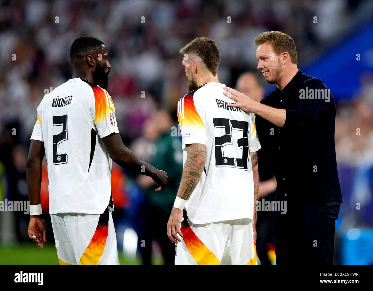 Germany manager Julian Nagelsmann speaks to Robert Andrich during the ...