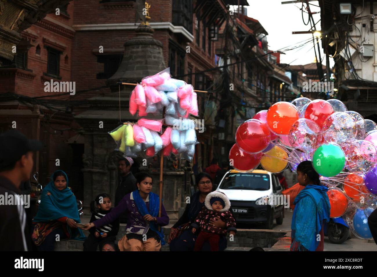 Kathmandu, Nepal November 20 2023: hawker sell the local food and sweet ...