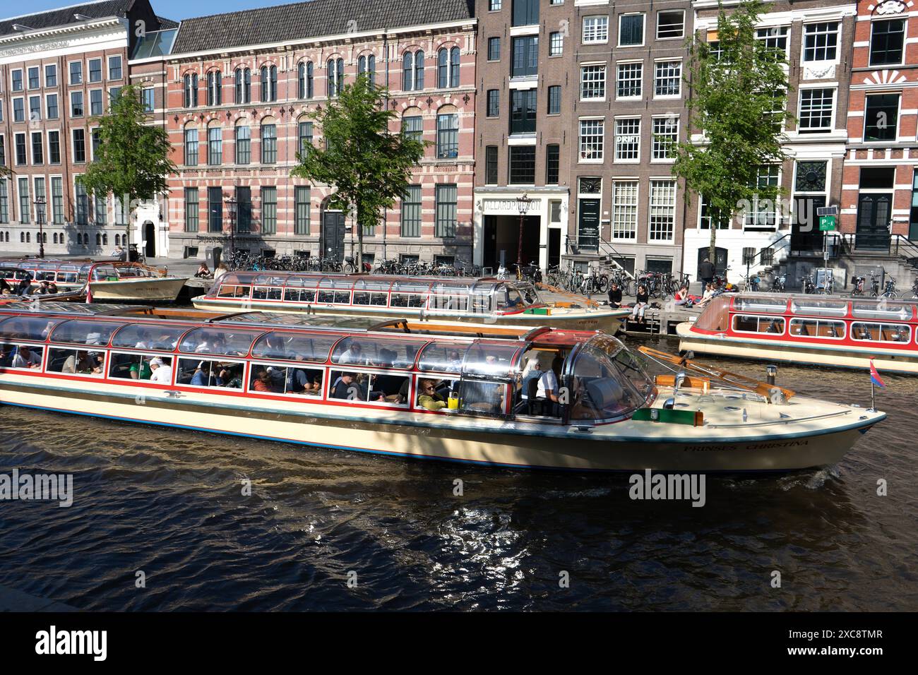 Tourist cruise boats rokin hi-res stock photography and images - Alamy