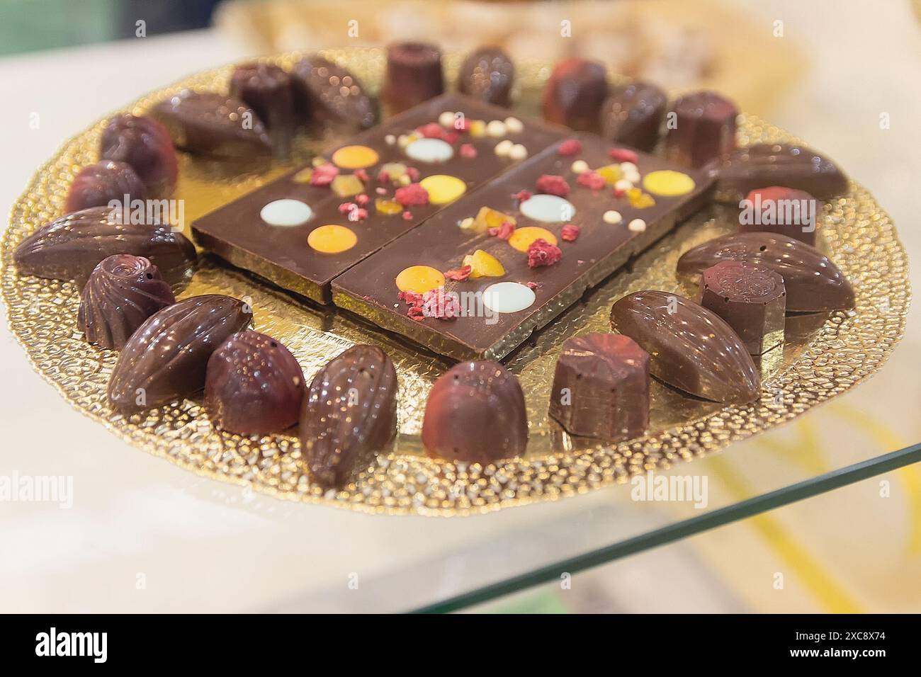 Luxurious chocolates on a store window. Sweets Stock Photo - Alamy