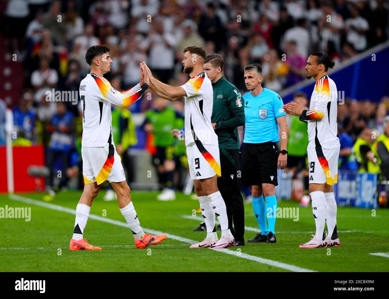 Germany's Kai Havertz (left) is substituted for team-mate Niclas ...