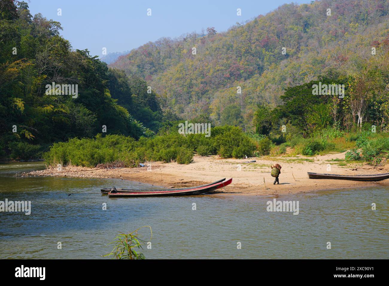 Longtail boats on the Pai River crossing towards the Huay Pu Keng long ...
