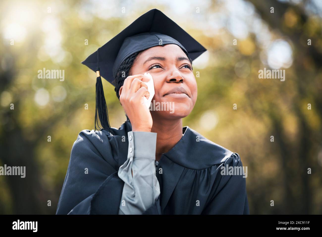 Outdoor, black woman and crying on graduation day, scholarship and ...