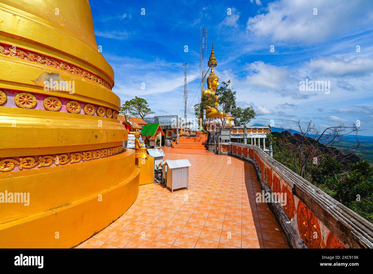 Golden stupa (shrine) in the shape of a bell at the hilltop pagoda of ...
