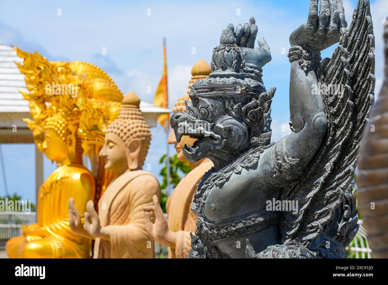 Statue of a Buddhist demon on the hilltop platform of the Great Buddha ...