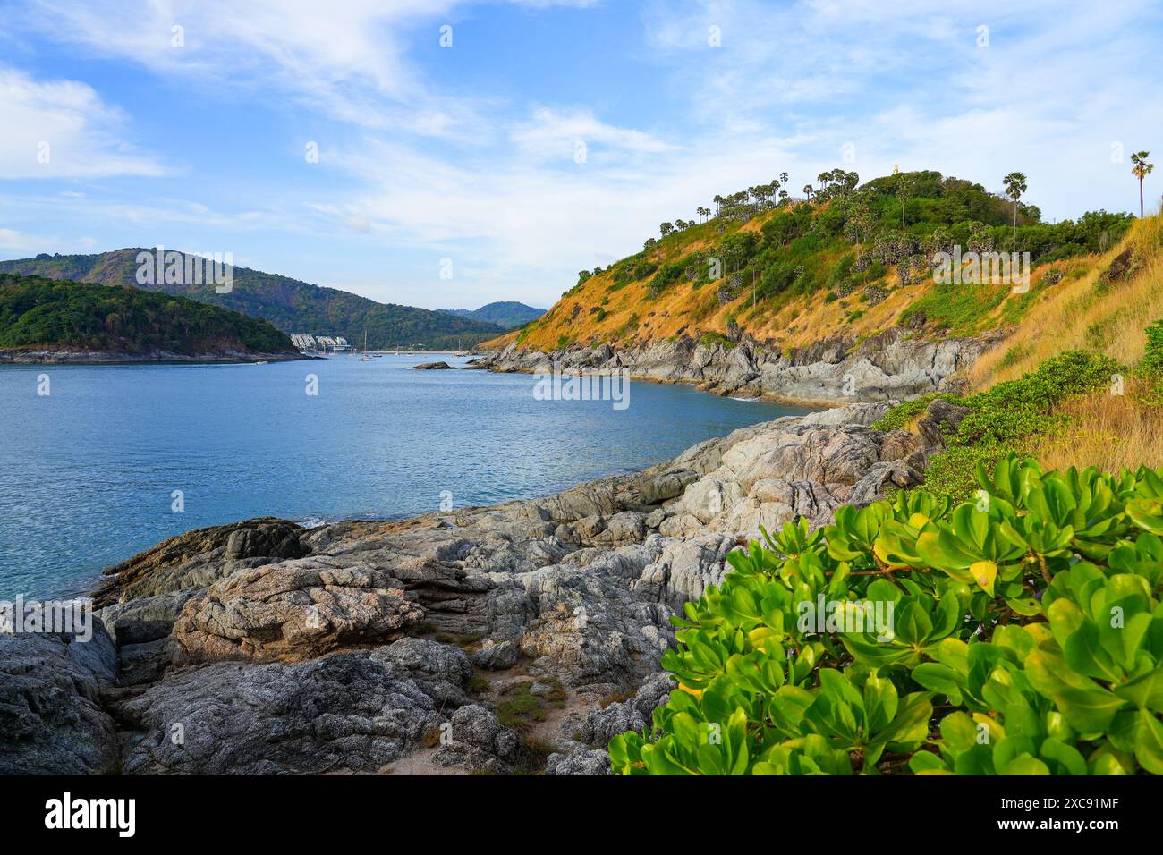 Grassy coastline of Promthep Cape, the southernmost point of Phuket ...