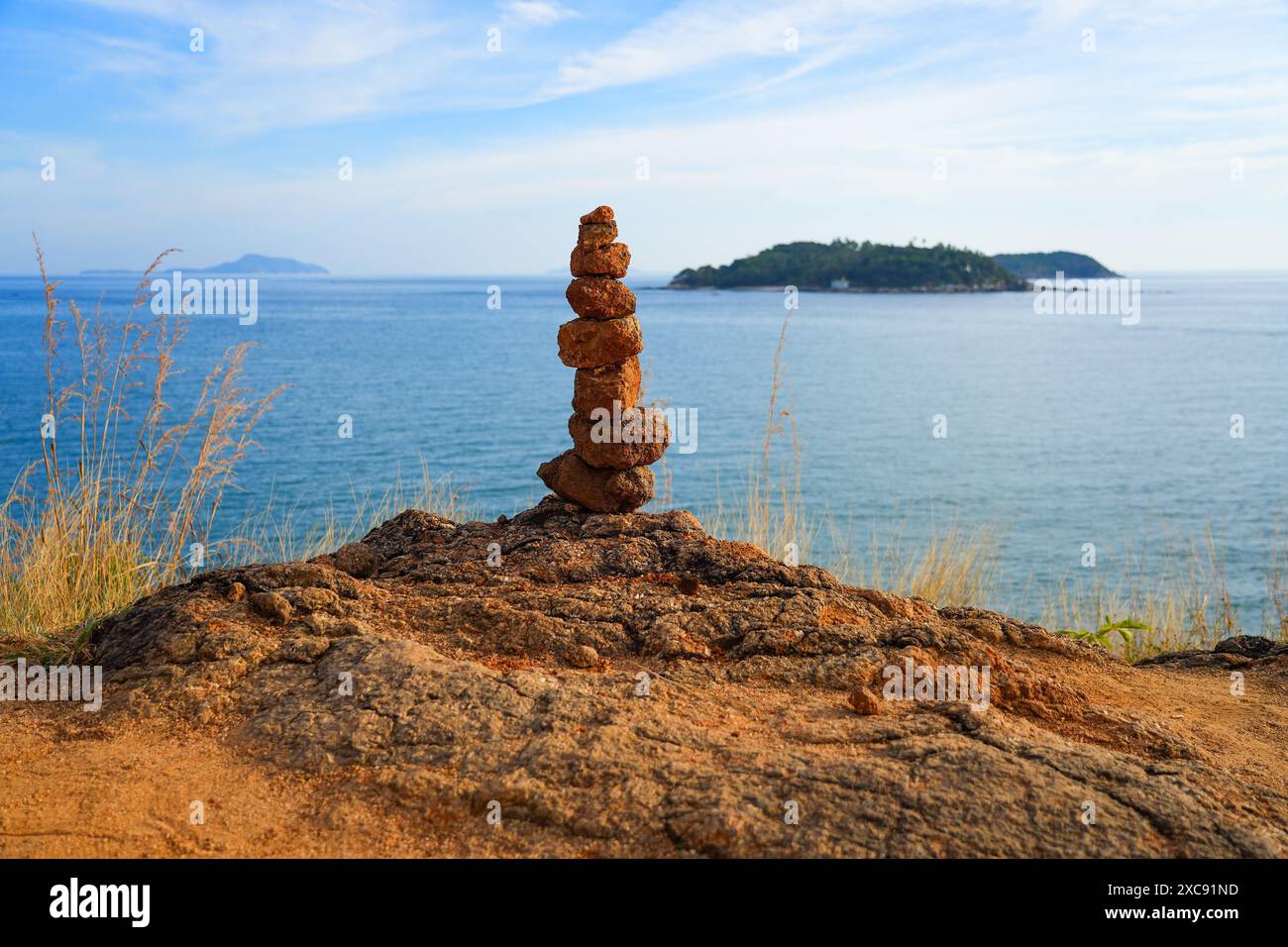 Stack of pebbles left by hikers on Promthep Cape, the southernmost ...