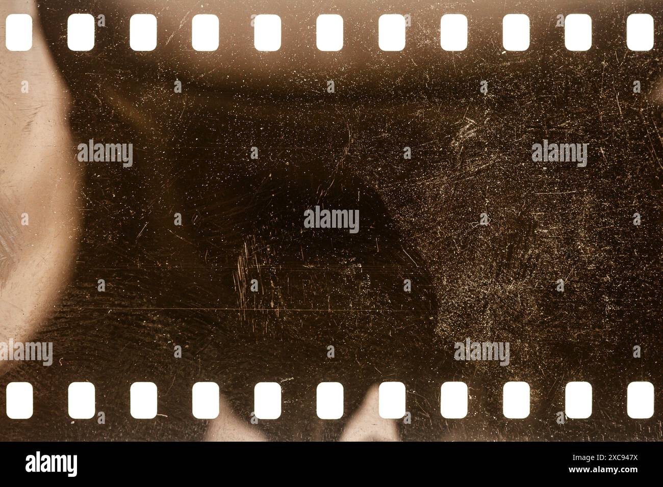 Dusty and grungy 35mm film texture or surface. Perforated scratched ...