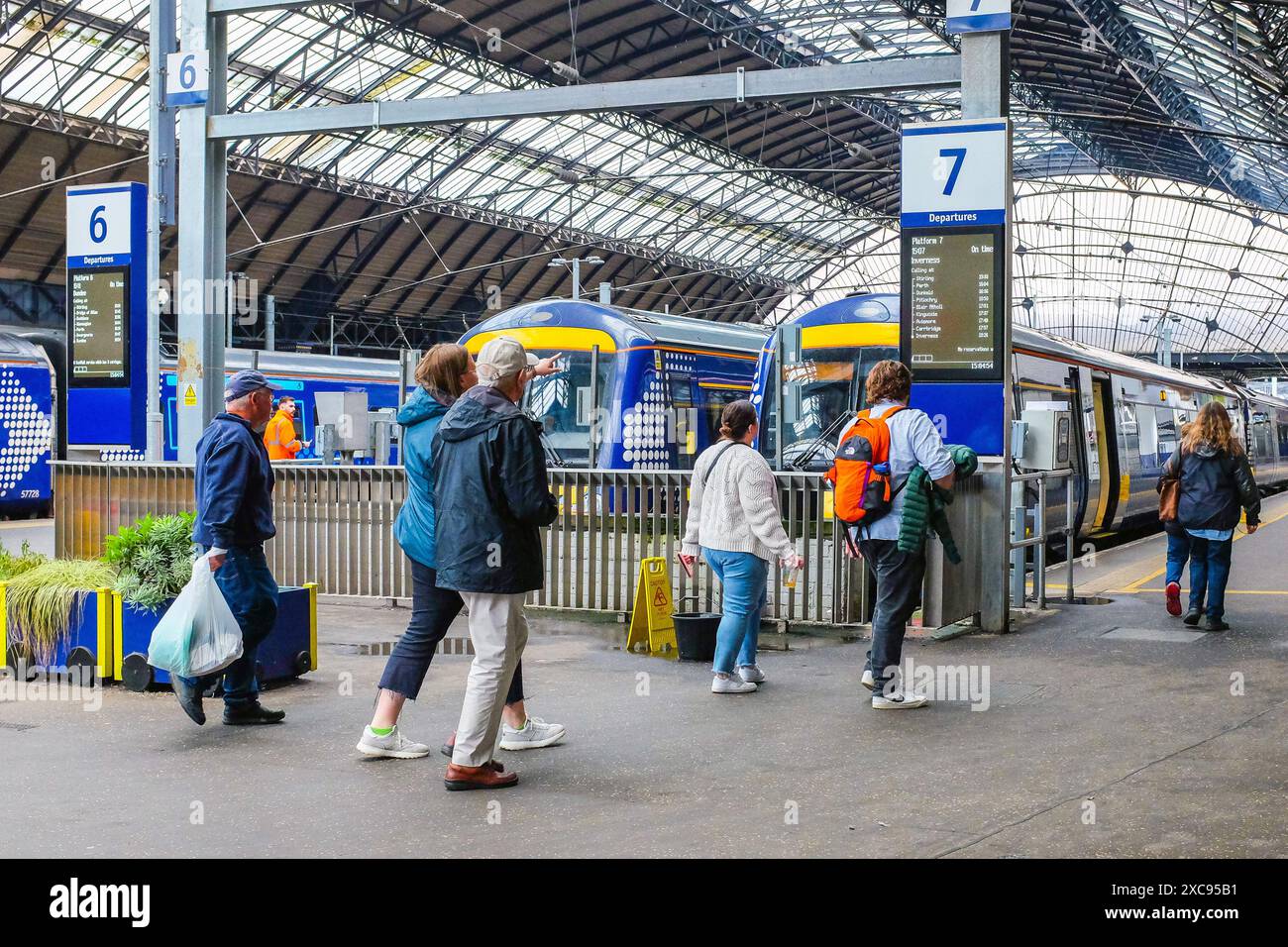 Passengers walking towards platform 7 on Queen Street railway station ...