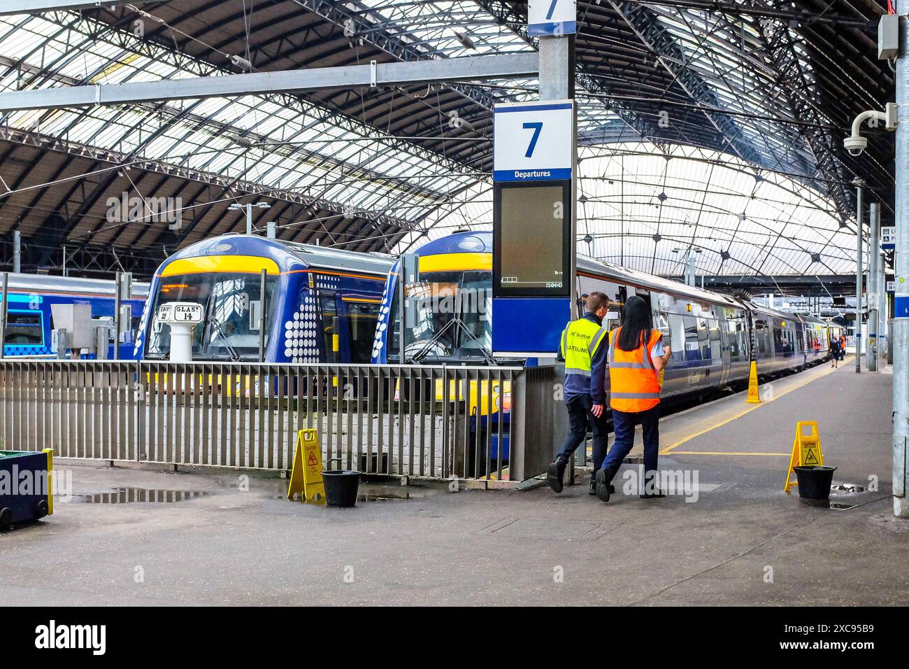 Scotrail emplyees making their way onto platform 7 at Queen Street ...